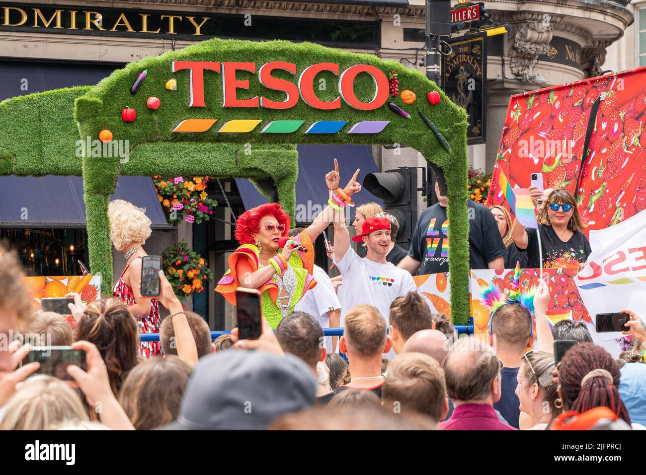 LA Voix performs on Tesco float surrounded by crowds of people during ...