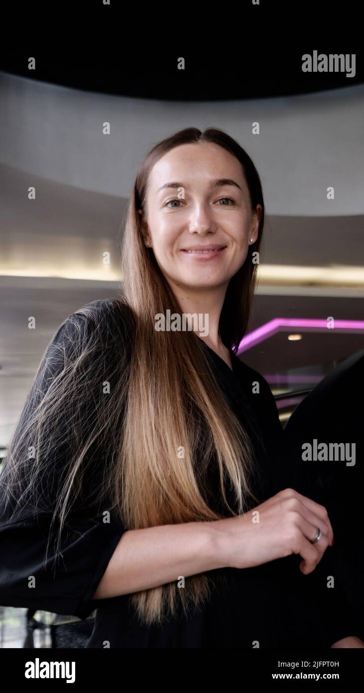 Attractive Snazzy Lady with Long Brunette Hair at Lounge Bar Cafe ...