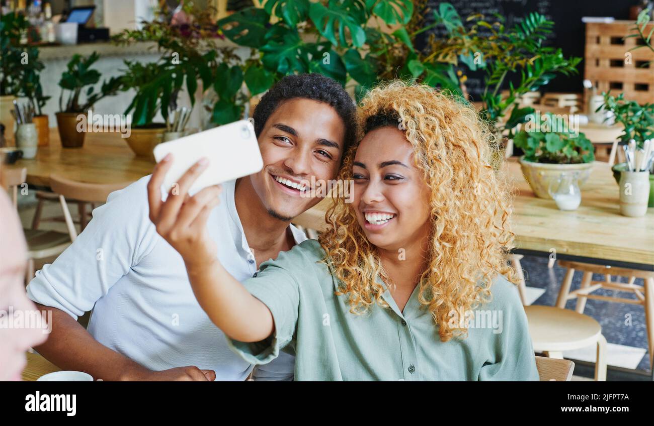 Making memories to last a lifetime. Shot of a young couple taking ...