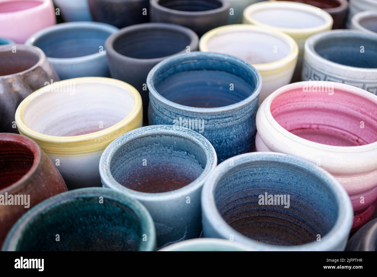 Empty ceramic flower pots in greenhouse or hothouse Stock Photo - Alamy