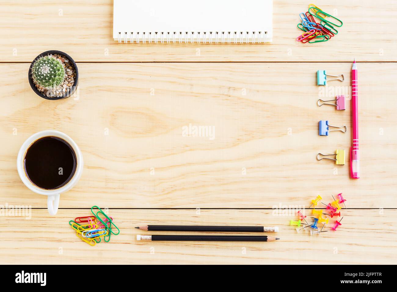 Flat lay office desk with notebooks, smart phone,pen,pencil,paperclip ...