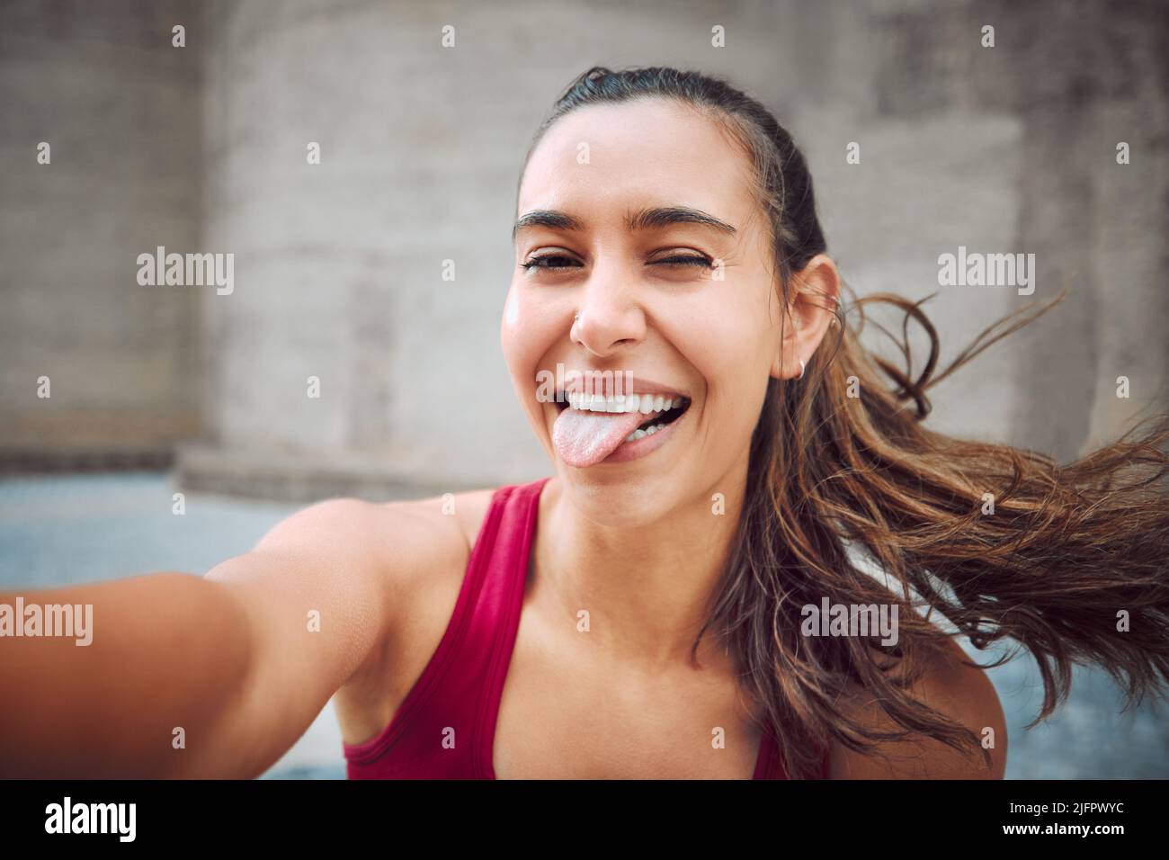 Finding The Fun In Fitness Cropped Portrait Of An Attractive Young Female Athlete Taking