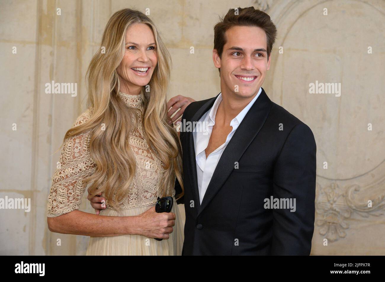 Paris, France. July 04, 2022, Elle Macpherson and son Flynn Busson ...