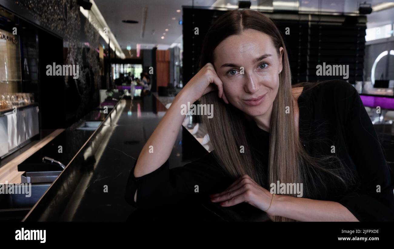 Attractive Snazzy Lady with Long Brunette Hair at Lounge Bar Cafe ...