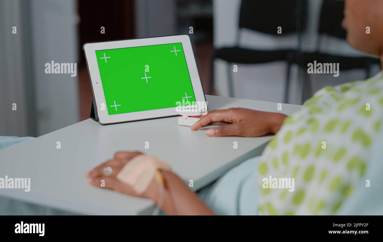 Close up of horizontal green screen on digital tablet in hospital ward ...