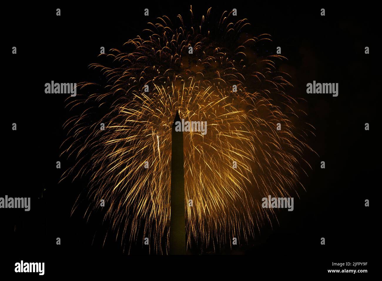 Colorful Independence Day fireworks explode behind the Washington ...