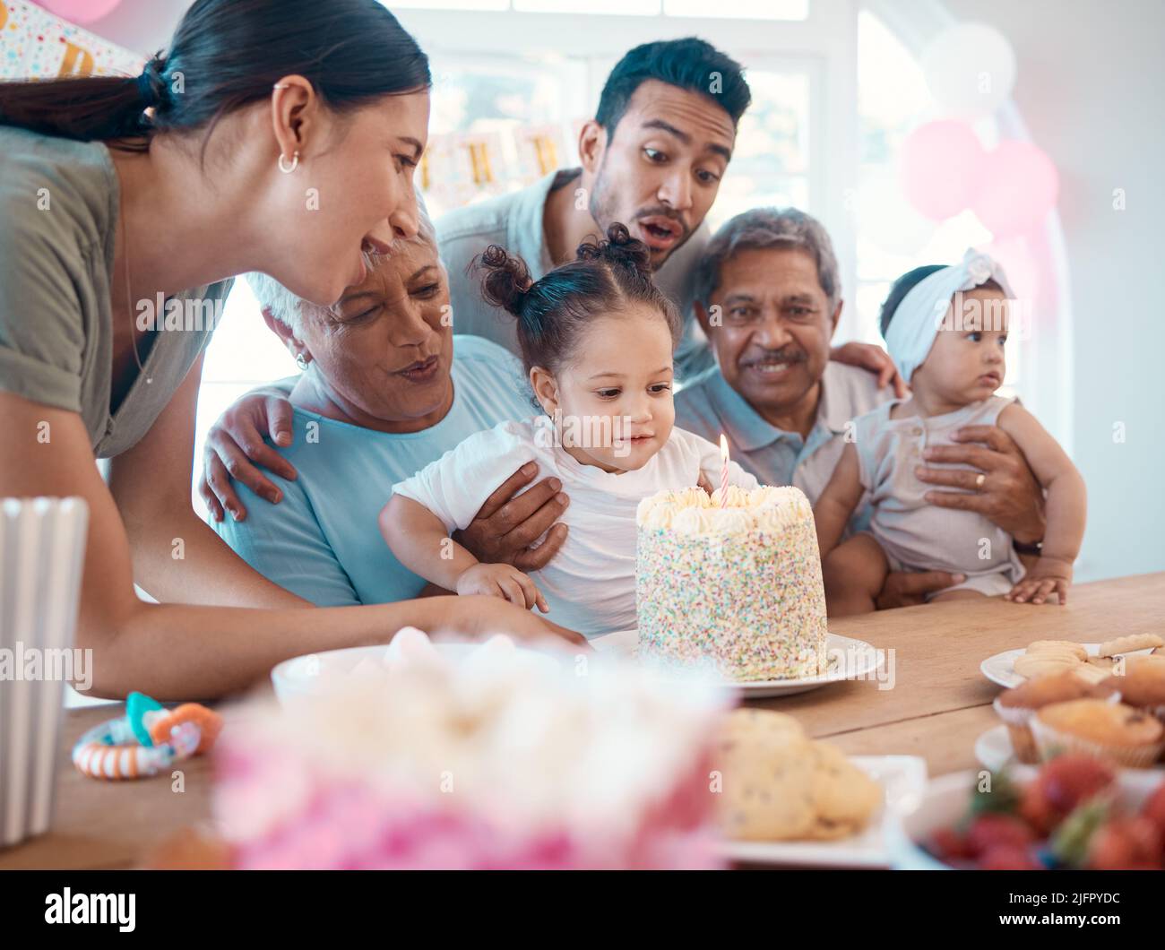 Its your birthday. Shot of a family celebrating a birthday together at ... Its your birthday. Shot of a family celebrating a birthday together at ...