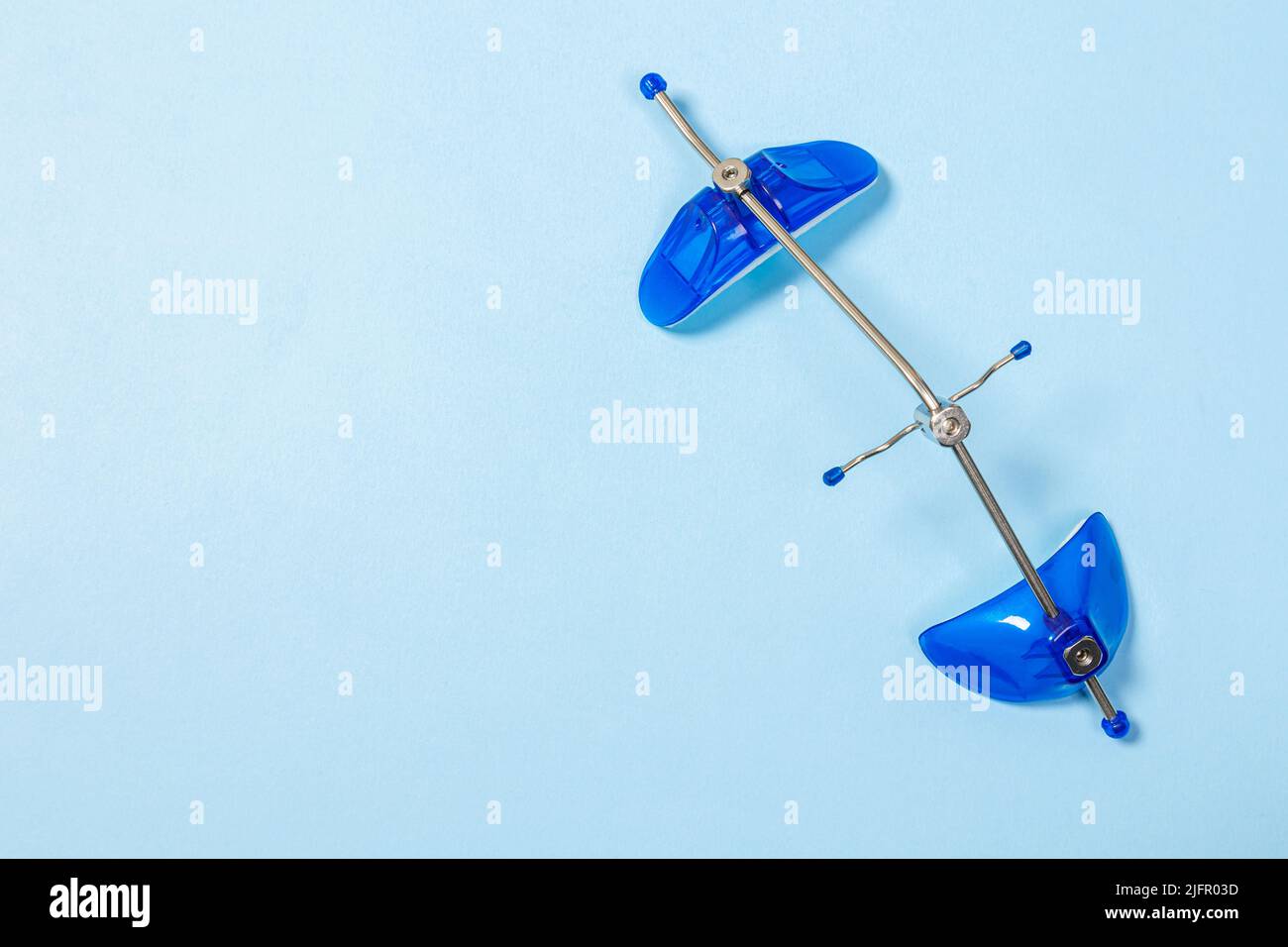 Orthodontic face mask Dental Petite Mask on a blue background special ...