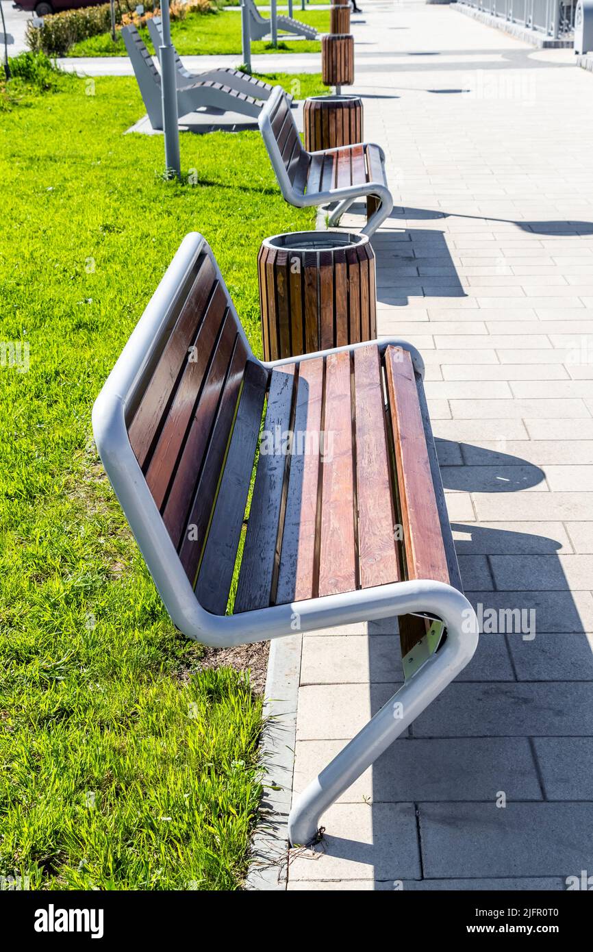 Benches in the city park on the embankment Stock Photo - Alamy