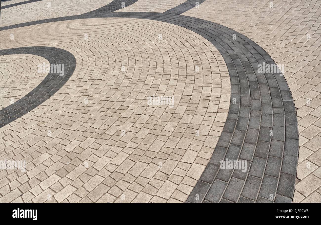 Street gray striped pavement of polished paving stones Stock Photo - Alamy