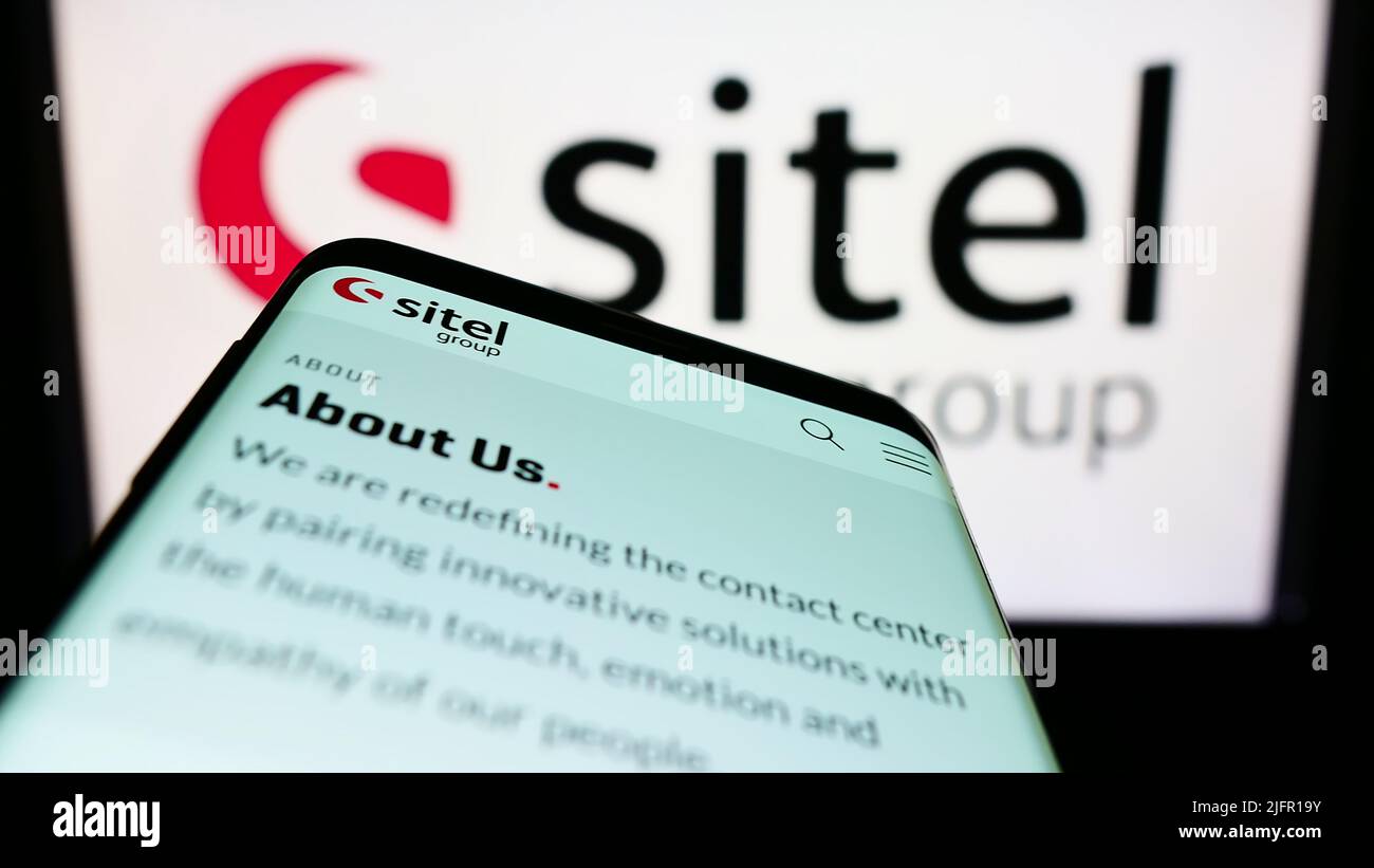Mobile phone with website of US contact center company Sitel Group on ...
