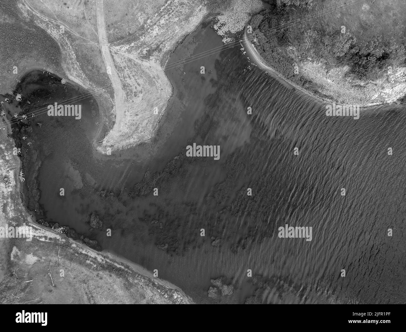 Eungella Dam Queensland Australia with low water levels showing texture ...