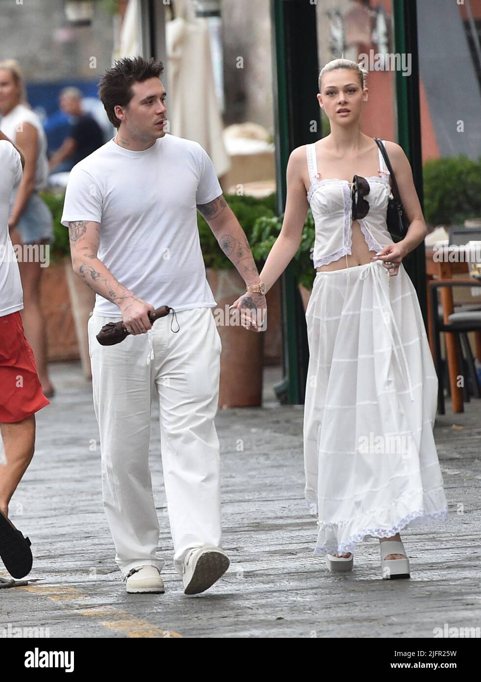 Portofino, . 04th July, 2022. Brooklyn Beckham and his wife Nicola ...