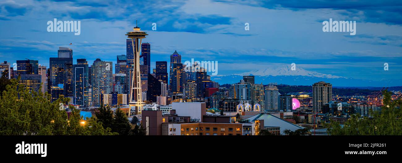 Downtown city skyline panoramic view with skyscrapers and Mount Rainier ...