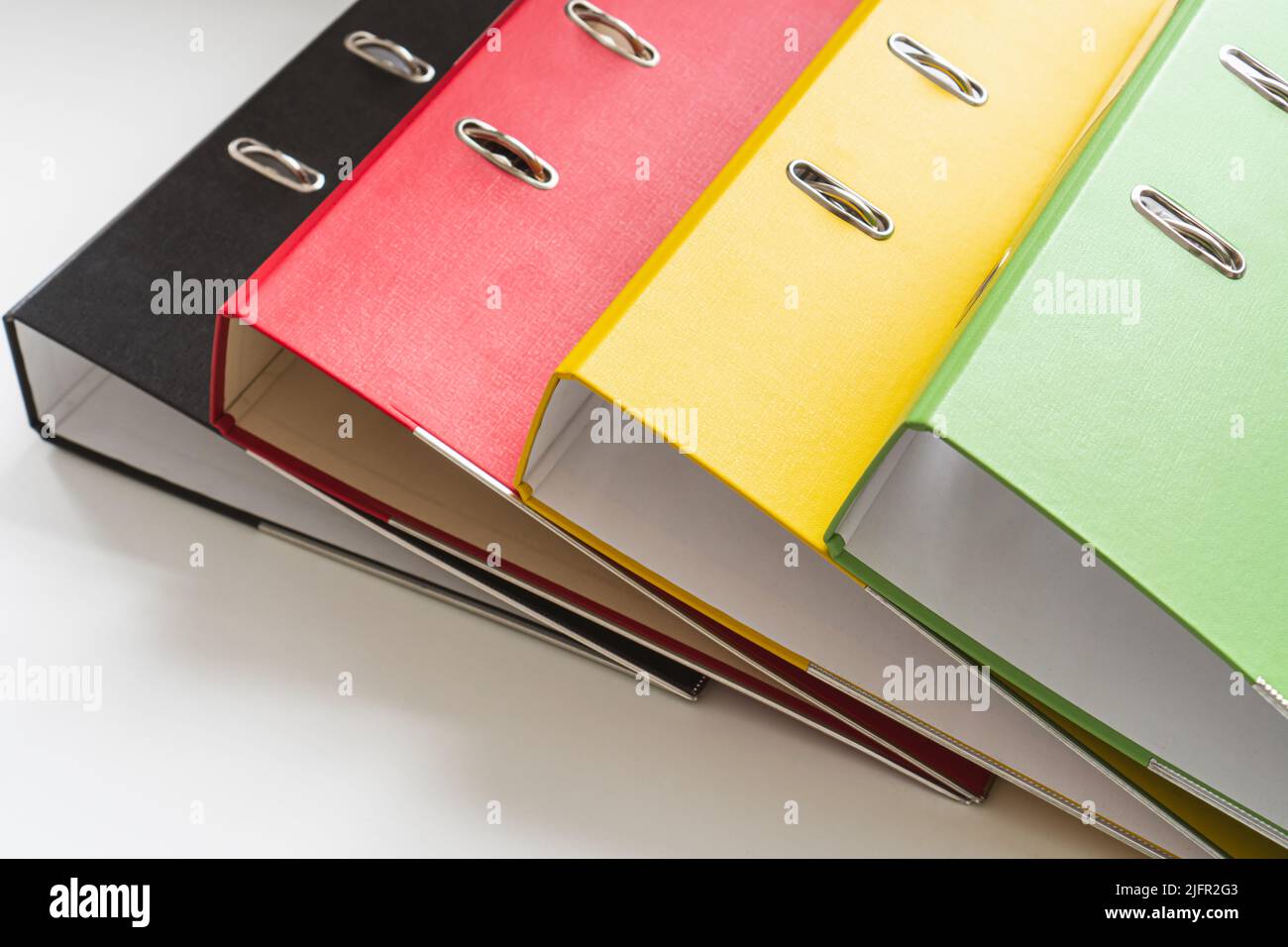 Color office document folders isolated on white background. High angle ...