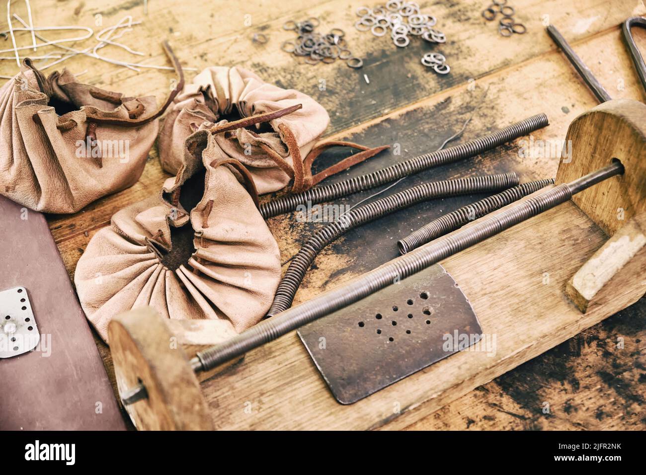 Manufacture of medieval armor and chain mail to protect soldiers in ...