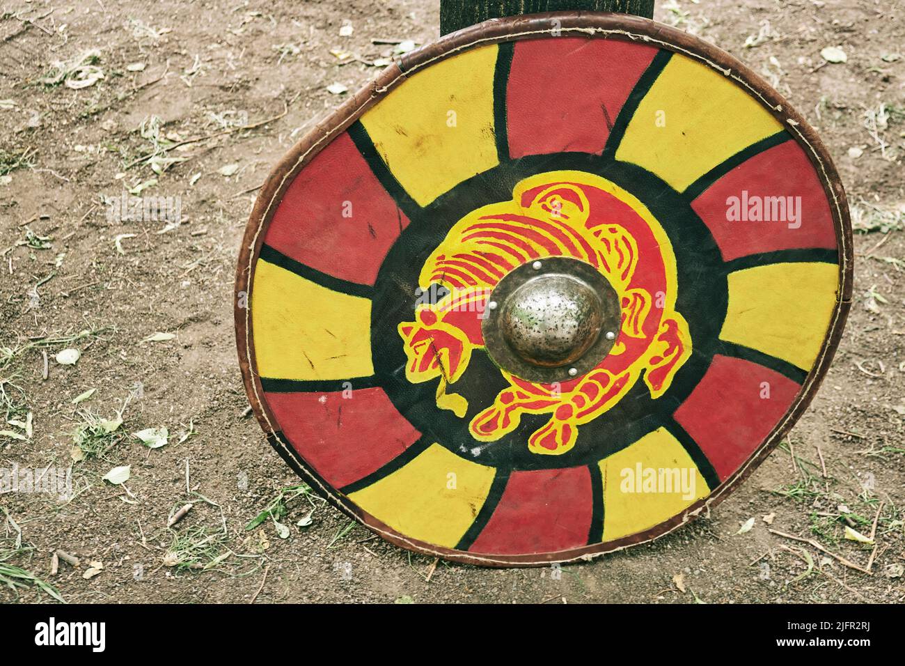 Red vintage shield with yellow animal lion a medieval warrior ...