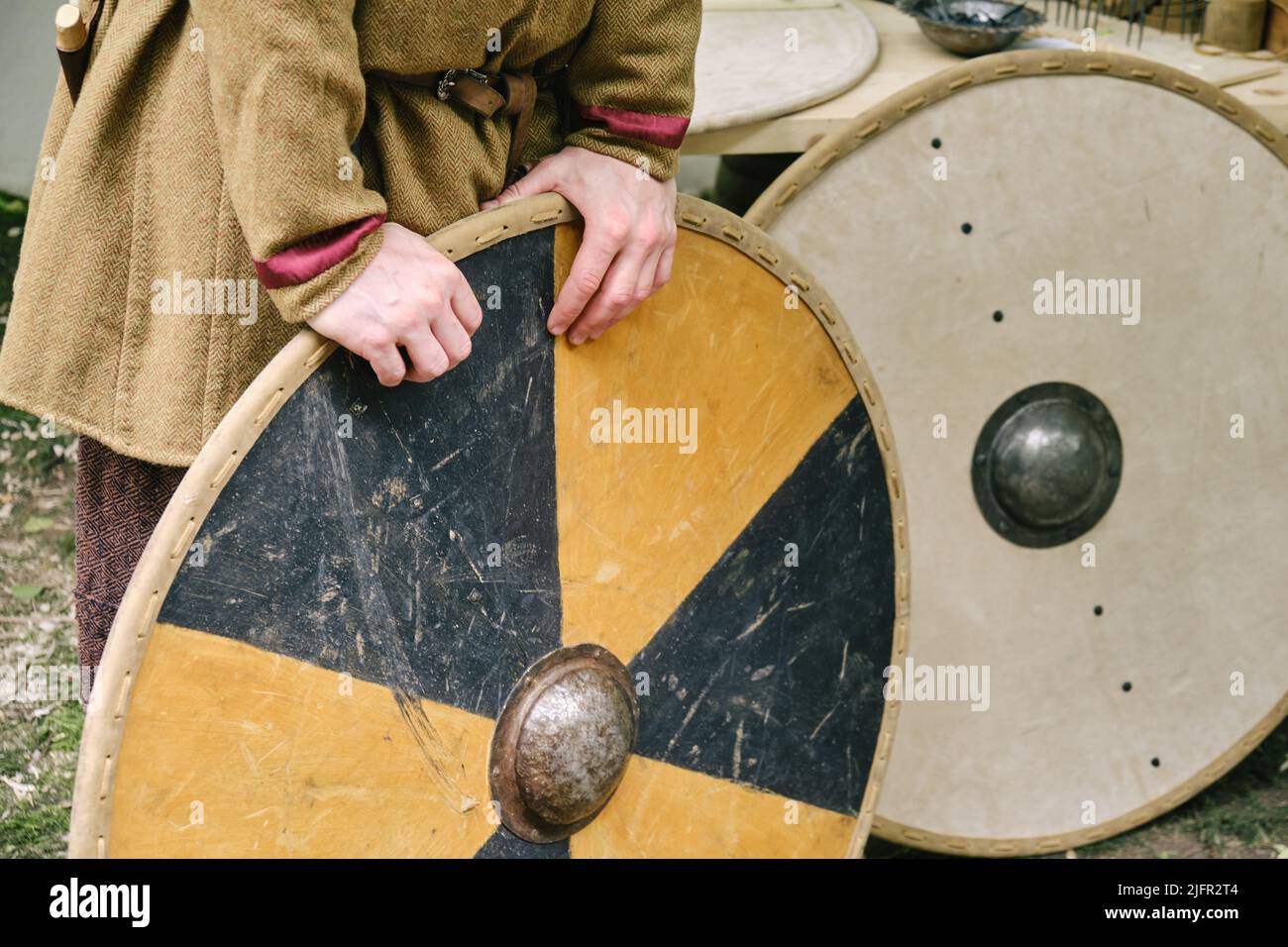 Making medieval shields made of wood and leather to protect soldiers in ...
