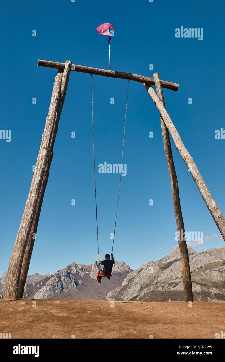 Huge swing surrounded by mountains in Riano village. Spain Stock Photo ...