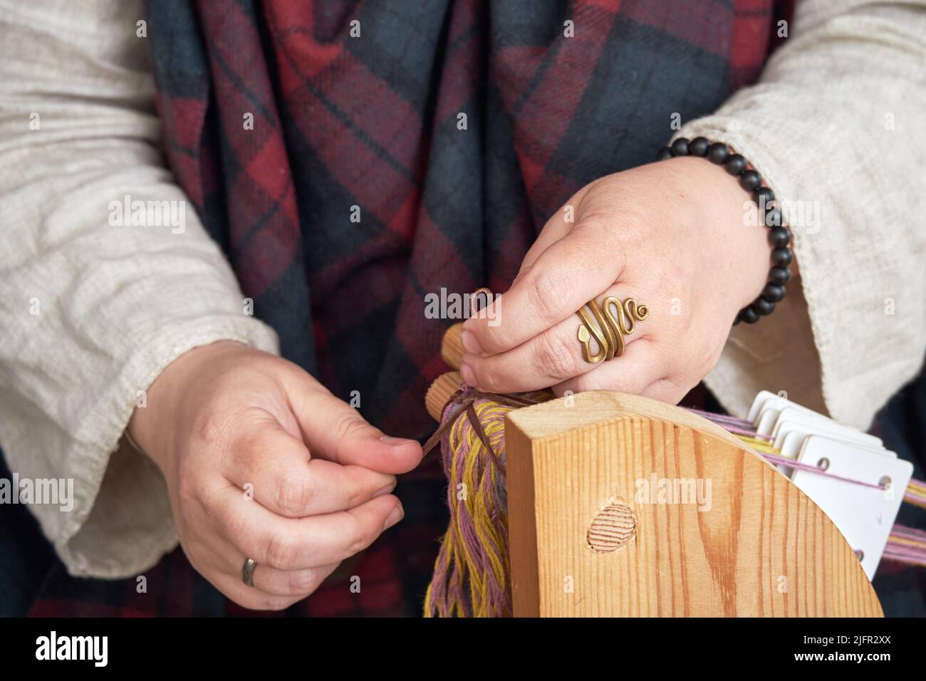 An ancient Roman woman makes yarn and sews from vintage wool ...