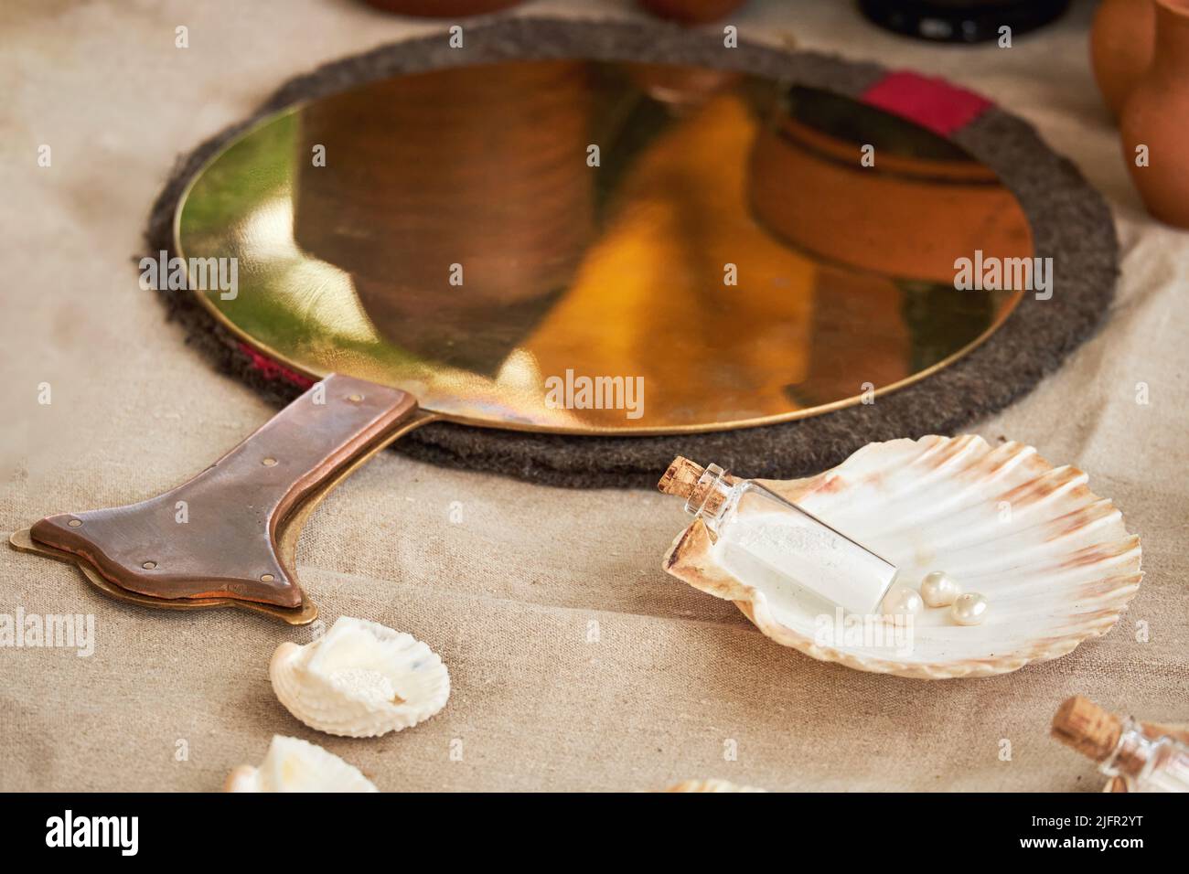 Ancient Roman mirror, retro perfume and vintage bath accessories ...