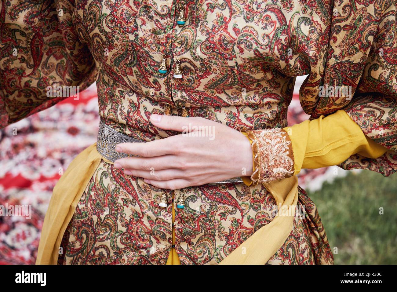 A woman in the clothes of Crimean Tatars with a beautiful ornament and ...