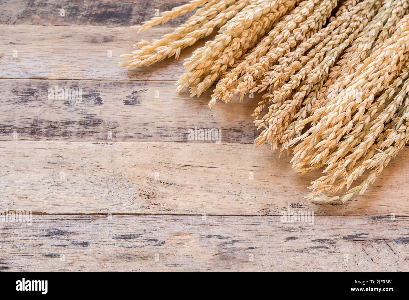 Wheat on the old wooden table background. top view with copy space ...