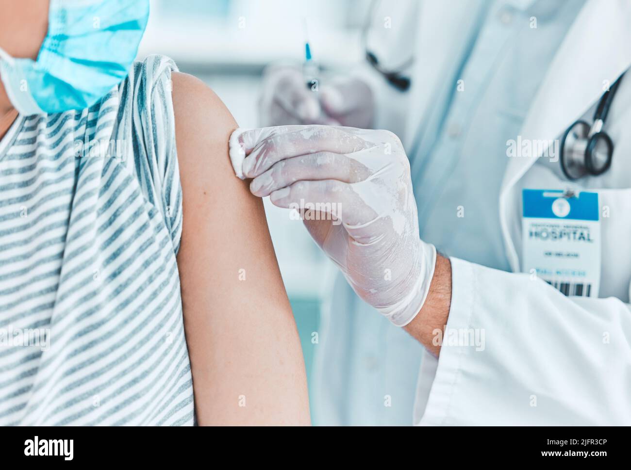 A small pinch and youre good as new. Shot of a doctor giving his ...