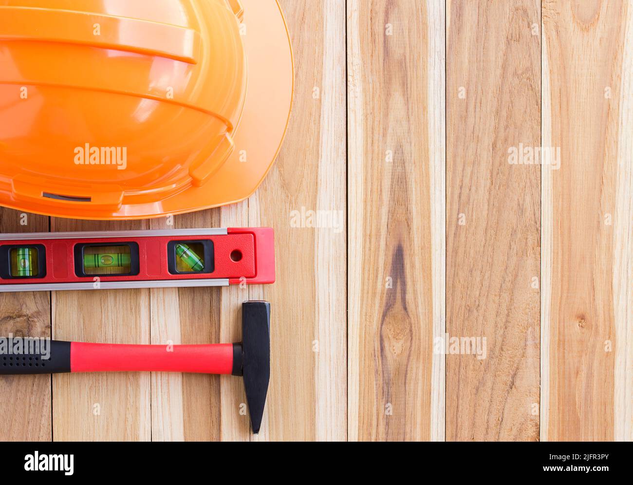 Safety equipment and tool kit on wooden table background with copy ...