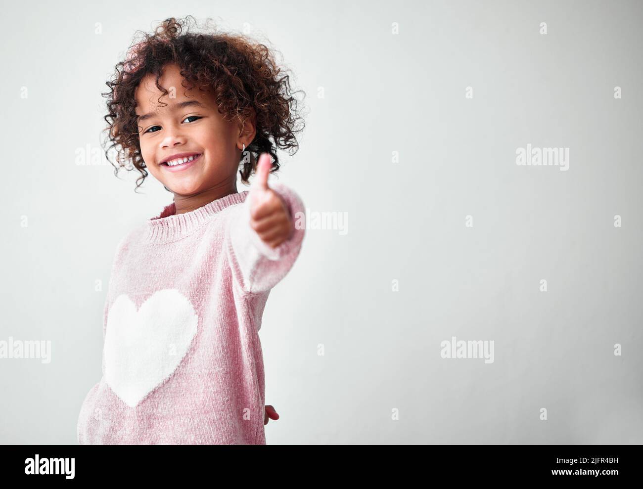 Nothing but good vibes. Shot of an adorable little girl standing alone ... Nothing but good vibes. Shot of an adorable little girl standing alone ...
