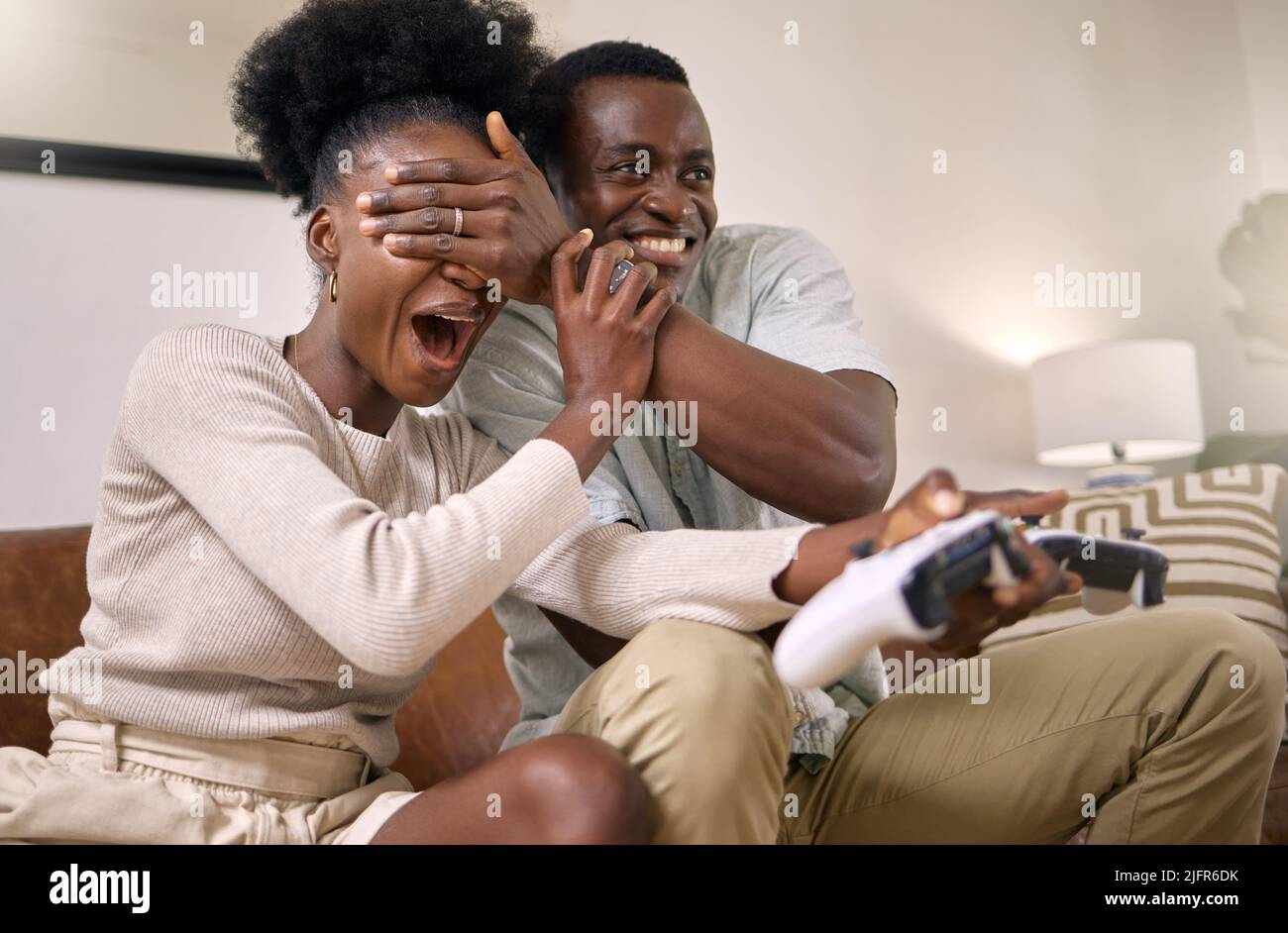 African woman playing video games hi-res stock photography and images ...