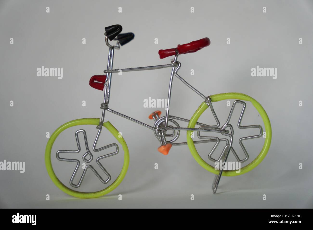 A miniature cycle model isolated on white background Stock Photo - Alamy