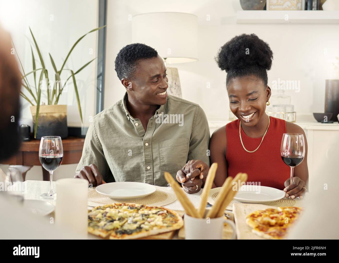 Sitting at dining table hi-res stock photography and images - Alamy