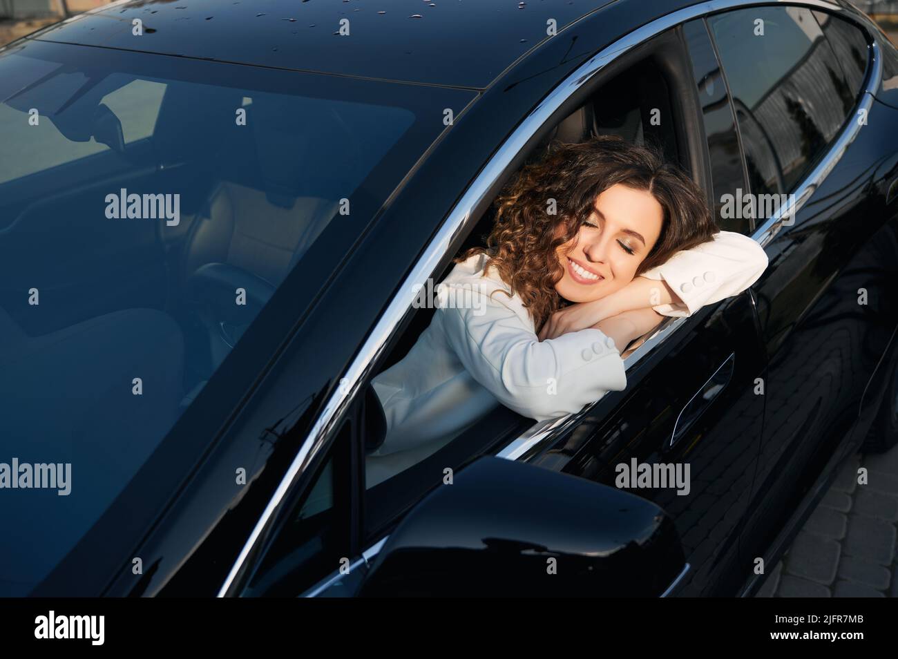 Young woman sleeping on vehicle seat hi-res stock photography and ...