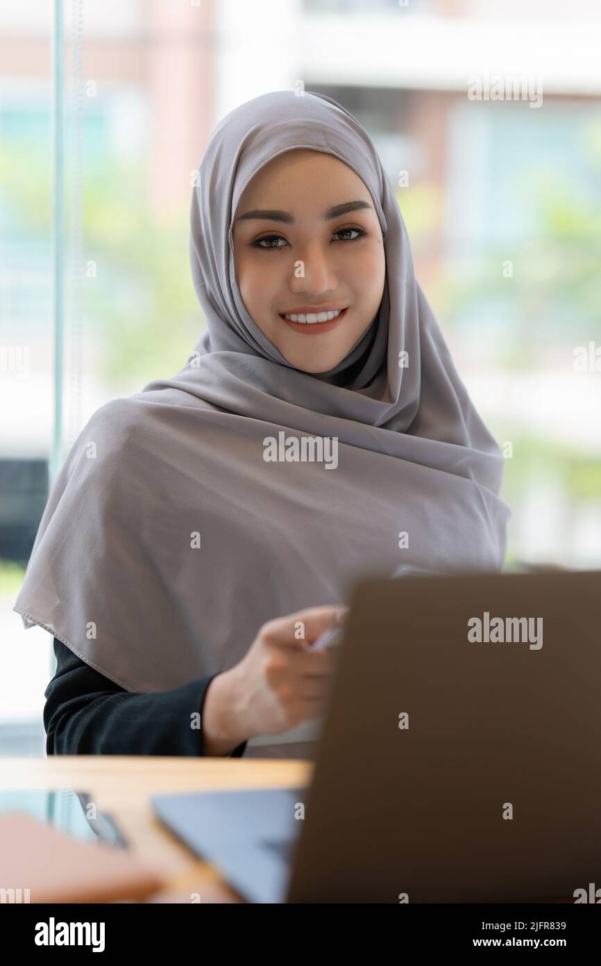 Business Finance audit tax Concept. Portrait of Muslim Young business ...