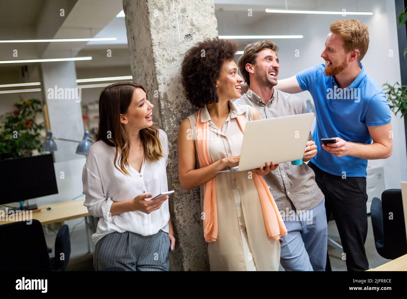 Group of happy friendly multiethnic business people having fun, working ...