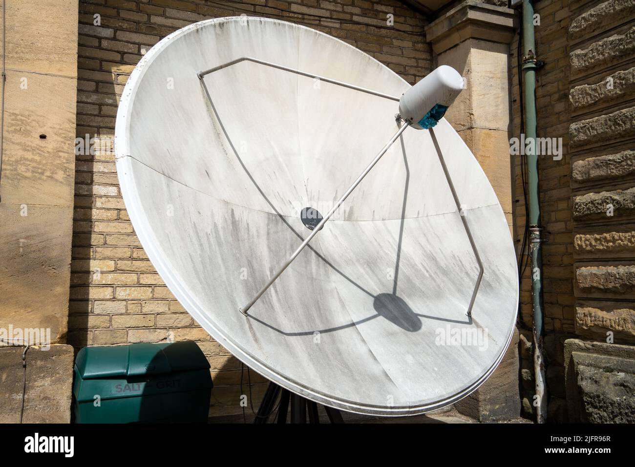 Large, old satellite dish outside of Salts Mill, Saltaire, Bradford, UK ...