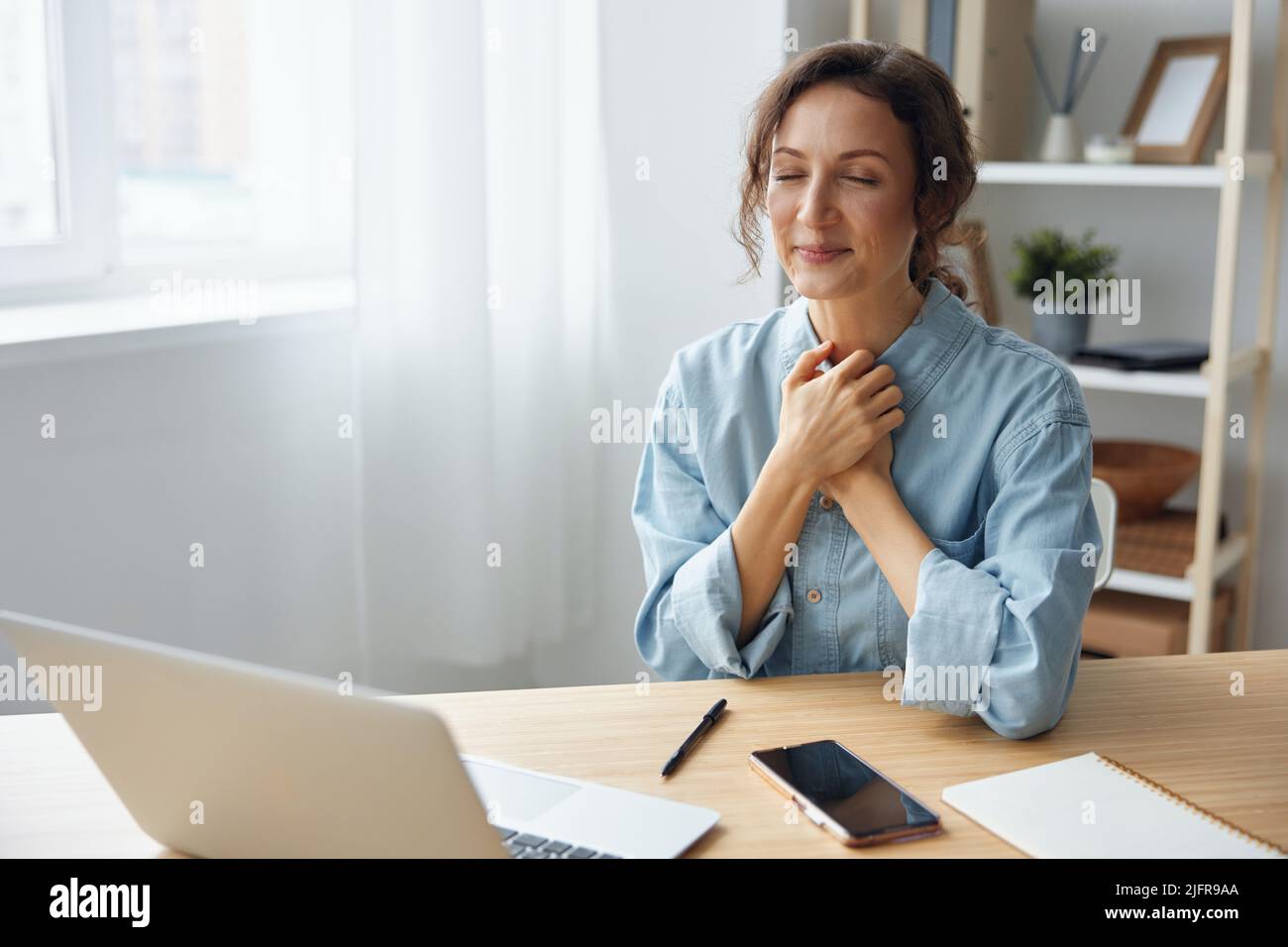 Happy enthusiastic joyful contented cute female office worker ...