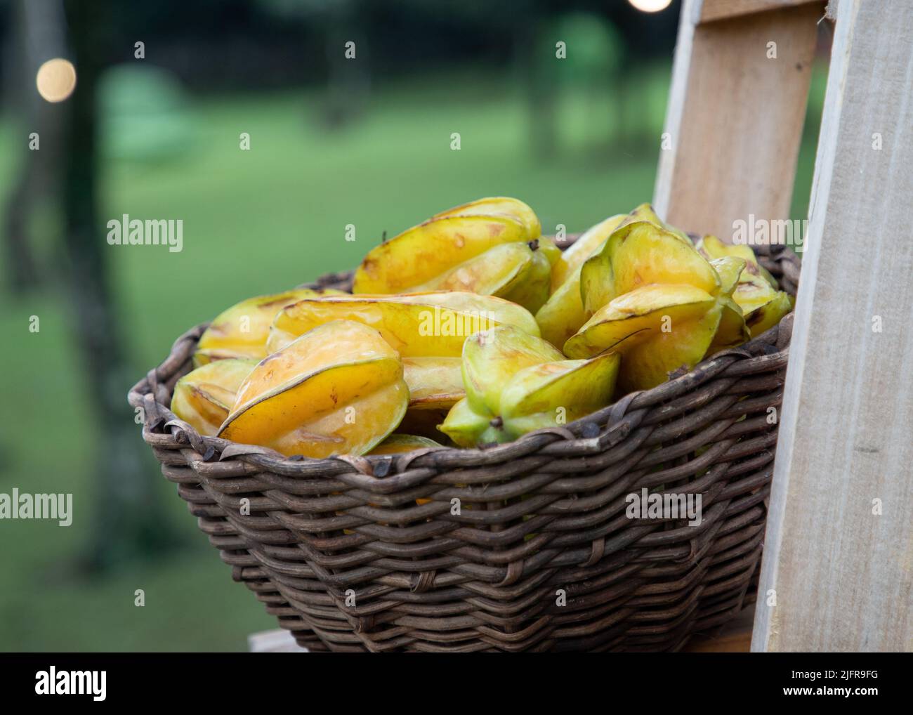 Star fruit in a basket hi-res stock photography and images - Alamy