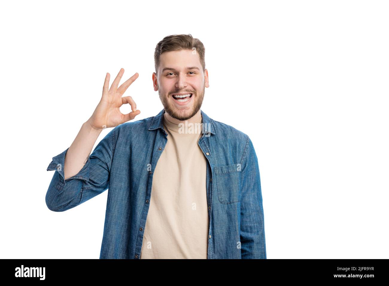 Joyful handsome man showing hi-res stock photography and images - Alamy
