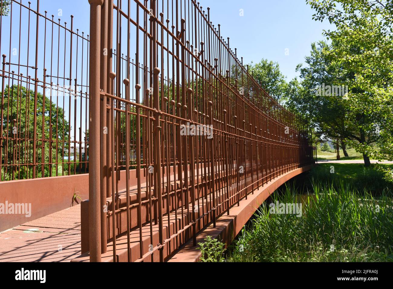 Den Helder, Netherlands. June 2022. A modern fence of rusty corten ...