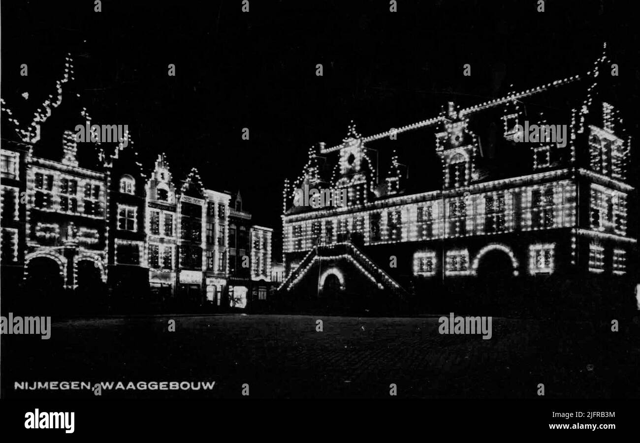 The Lighted Waaggebouw, on the left part of the West Wall Stock Photo ...
