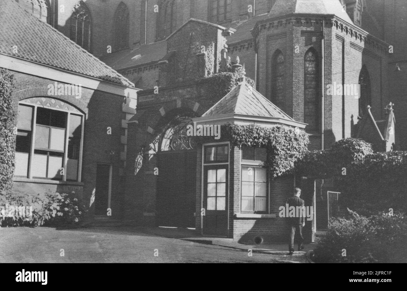 The porter's house with gate and the St.Franciscus church Stock Photo ...