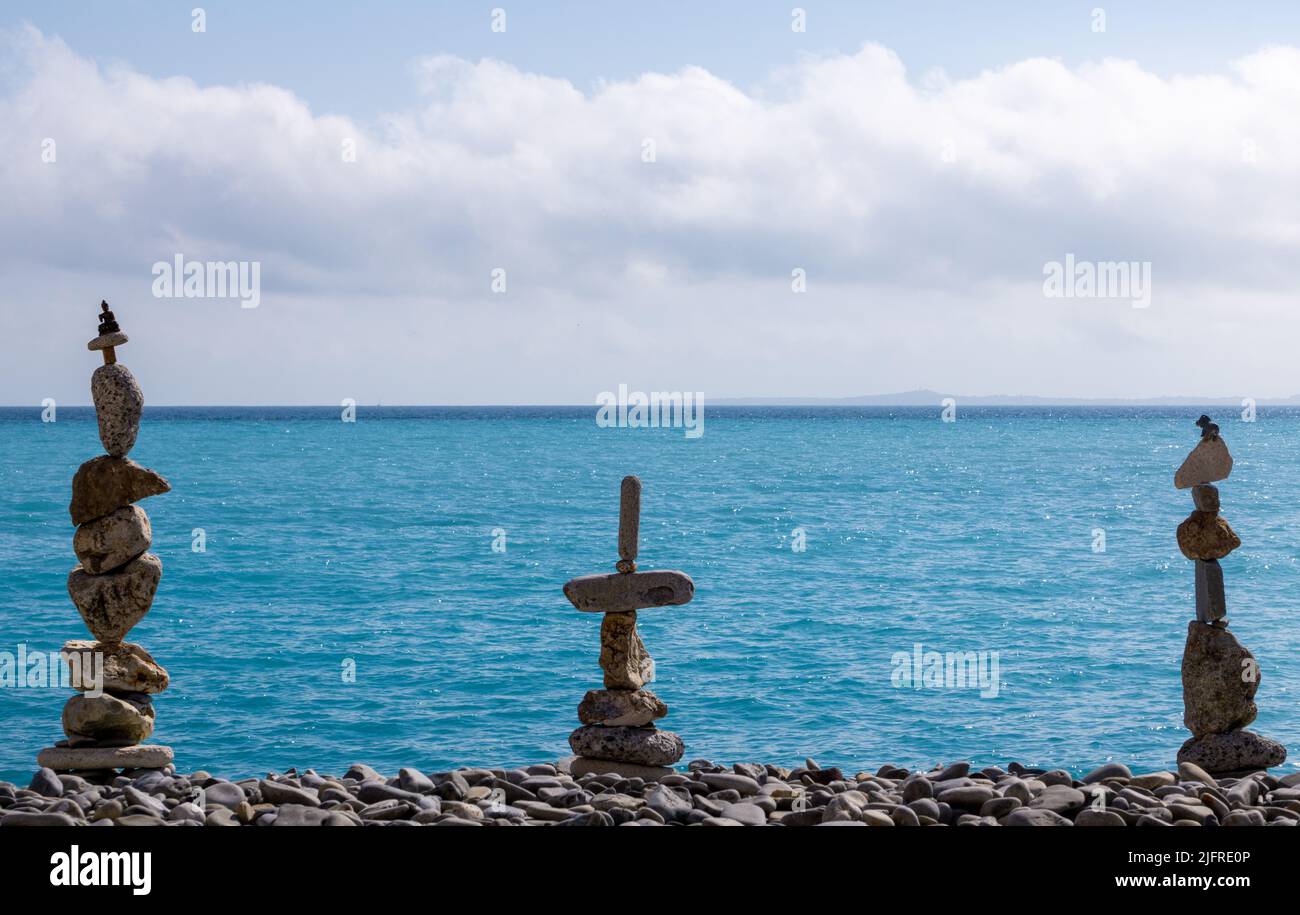Three beautiful pile of rocks placed in perfect balance. The art of ...