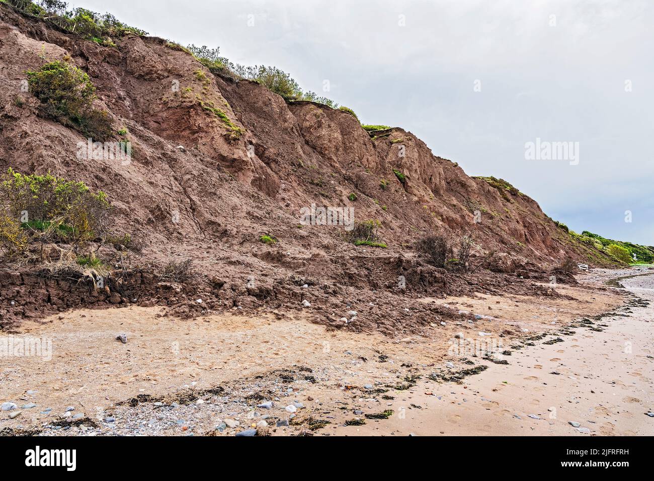 Thurstaston cliffs showing erosion after long period of heavy rain and ...