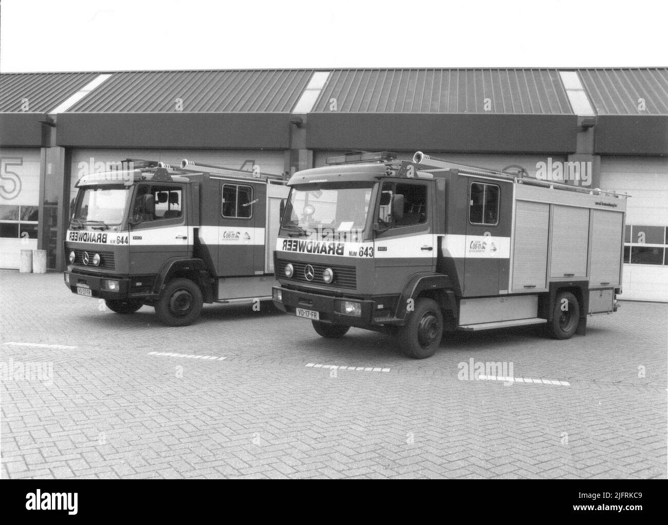 Two fire brigade cars Stock Photo - Alamy