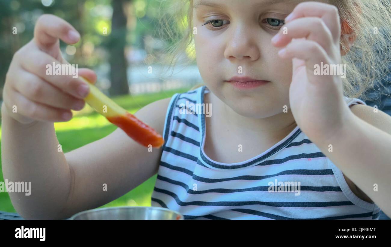 Child french fries food hi-res stock photography and images - Alamy