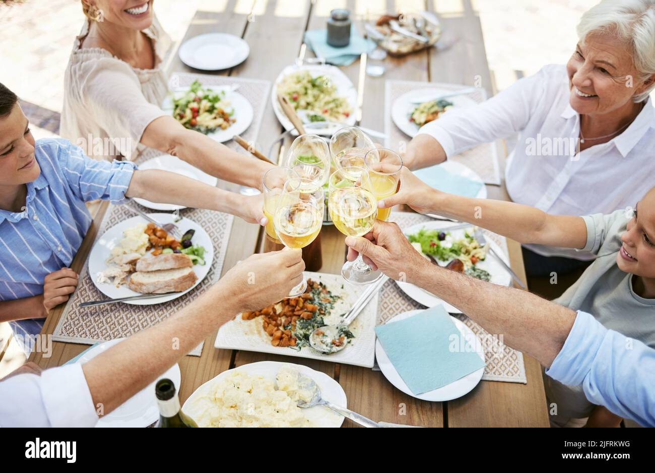 Cheers to good food and the people were sharing it with. Shot of a ...