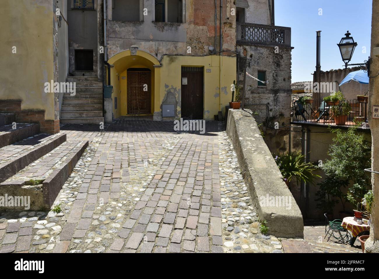 The old traditional houses and streets of Altomonte village, Calabria ...