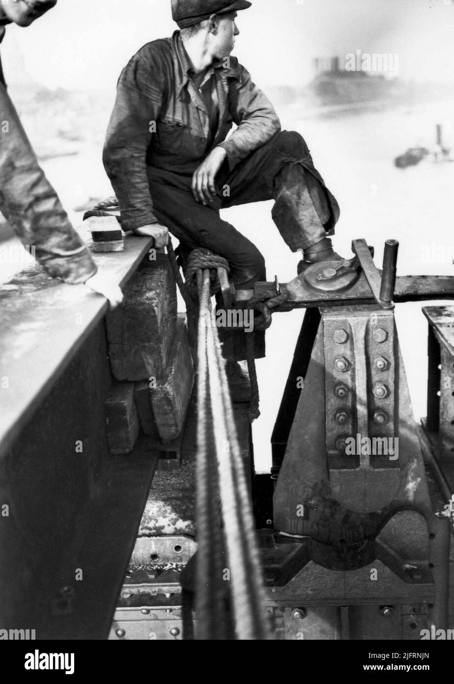Construction workers on job site Black and White Stock Photos & Images ...